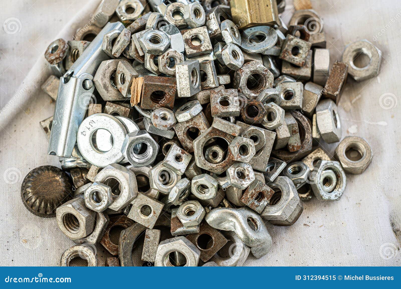 Piles of Nuts and Different Hardware on a Drop Sheet Stock Image ...