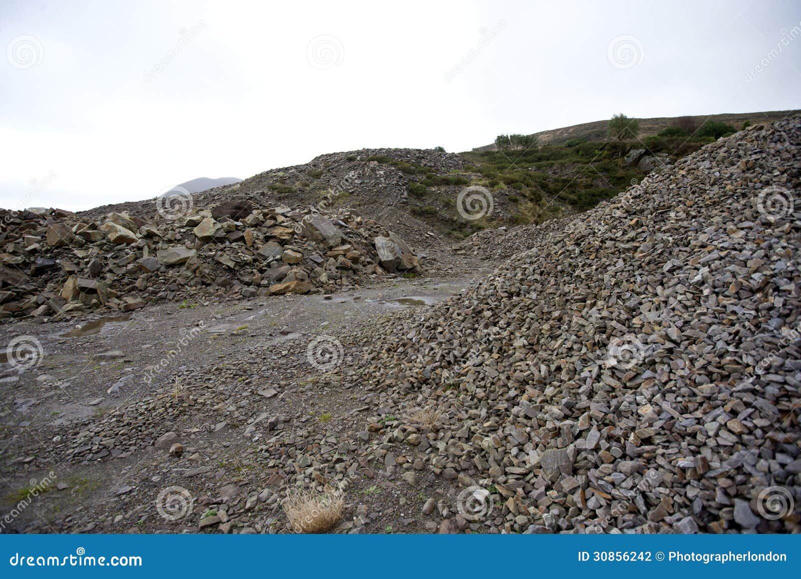 Piles of rock in quarry stock photo. Image of county - 30856242