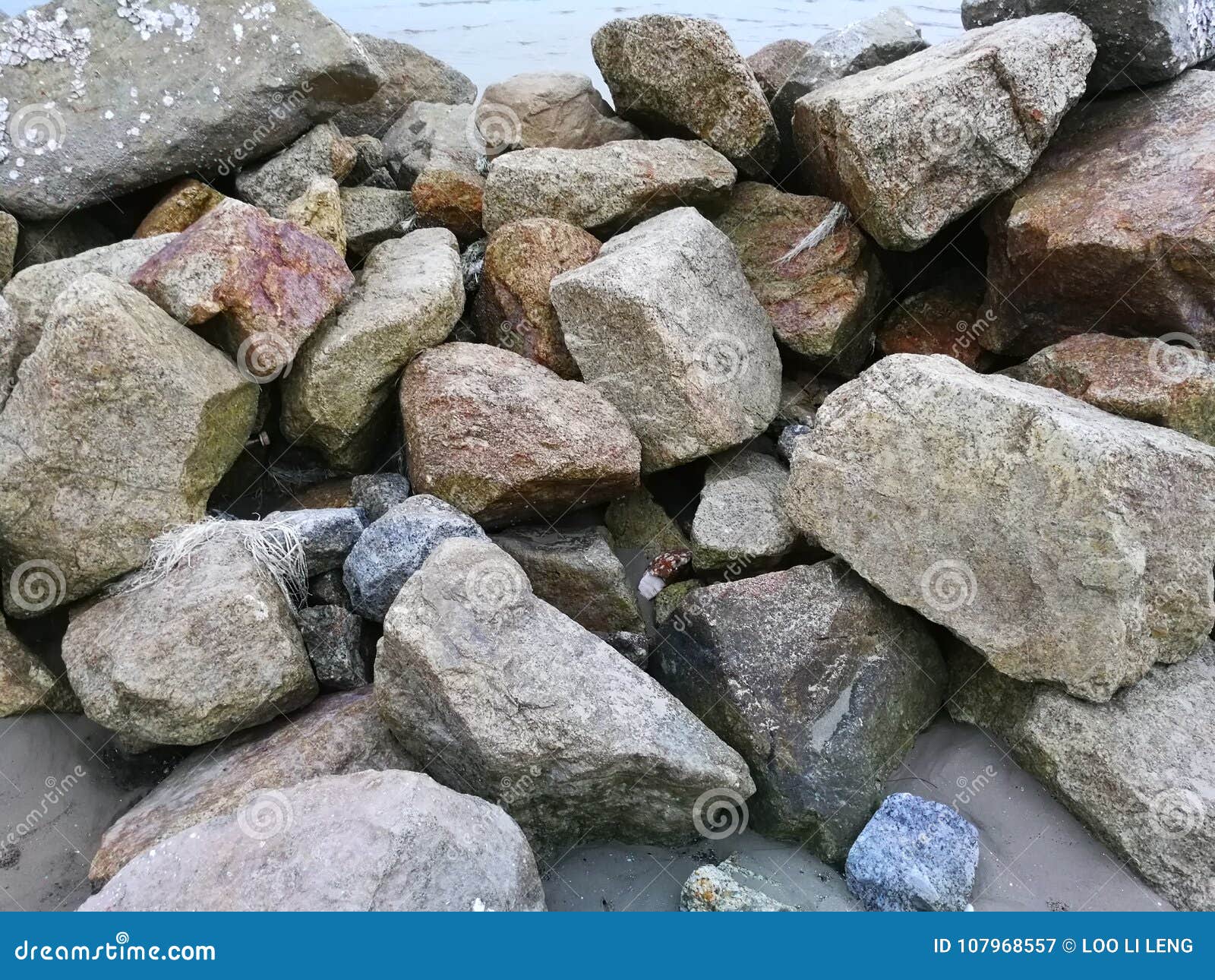 Piles of rocks stock image. Image of piles, rocks, shore - 107968557