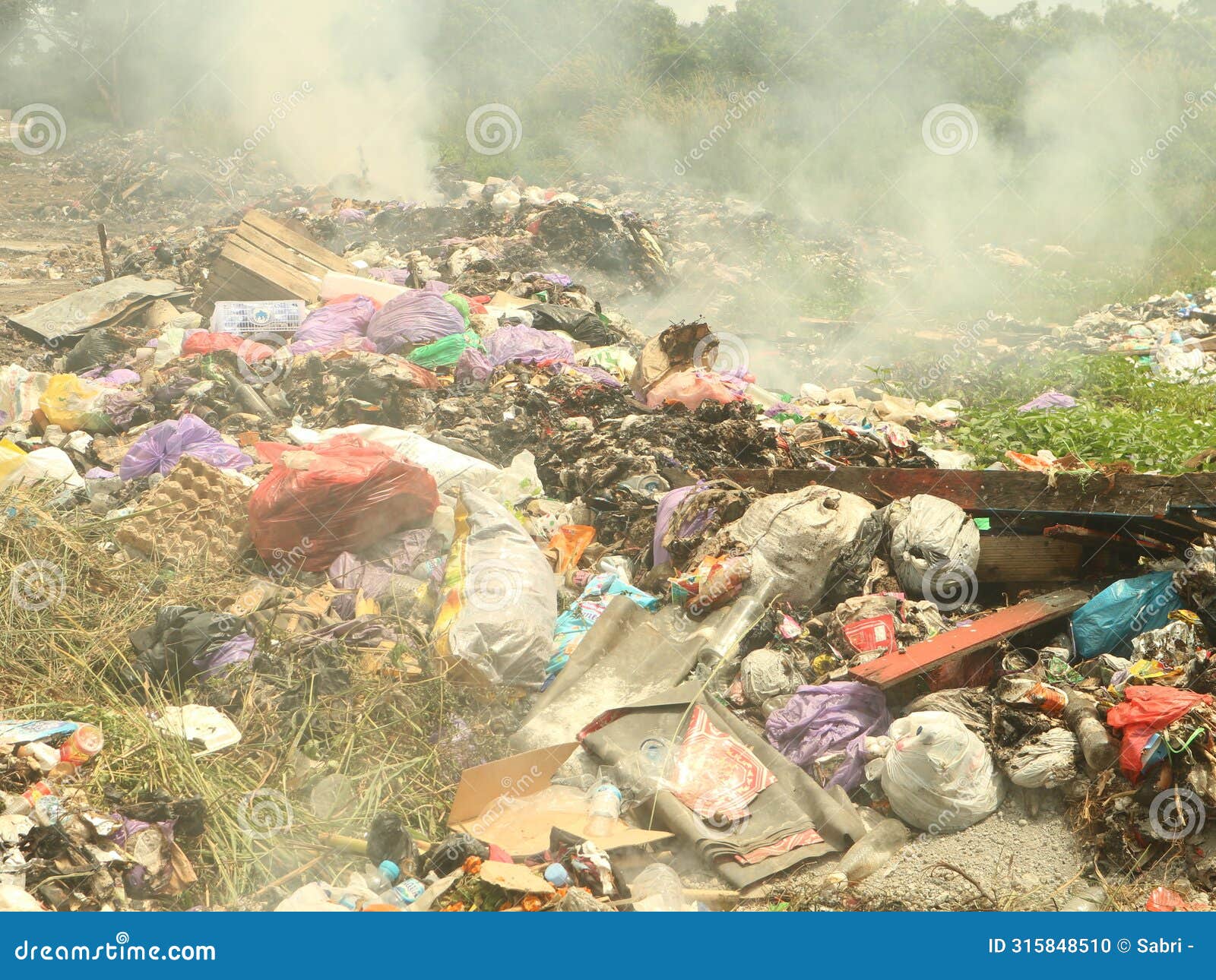 Pile of rubbish on fire stock photo. Image of screenshot - 315848510
