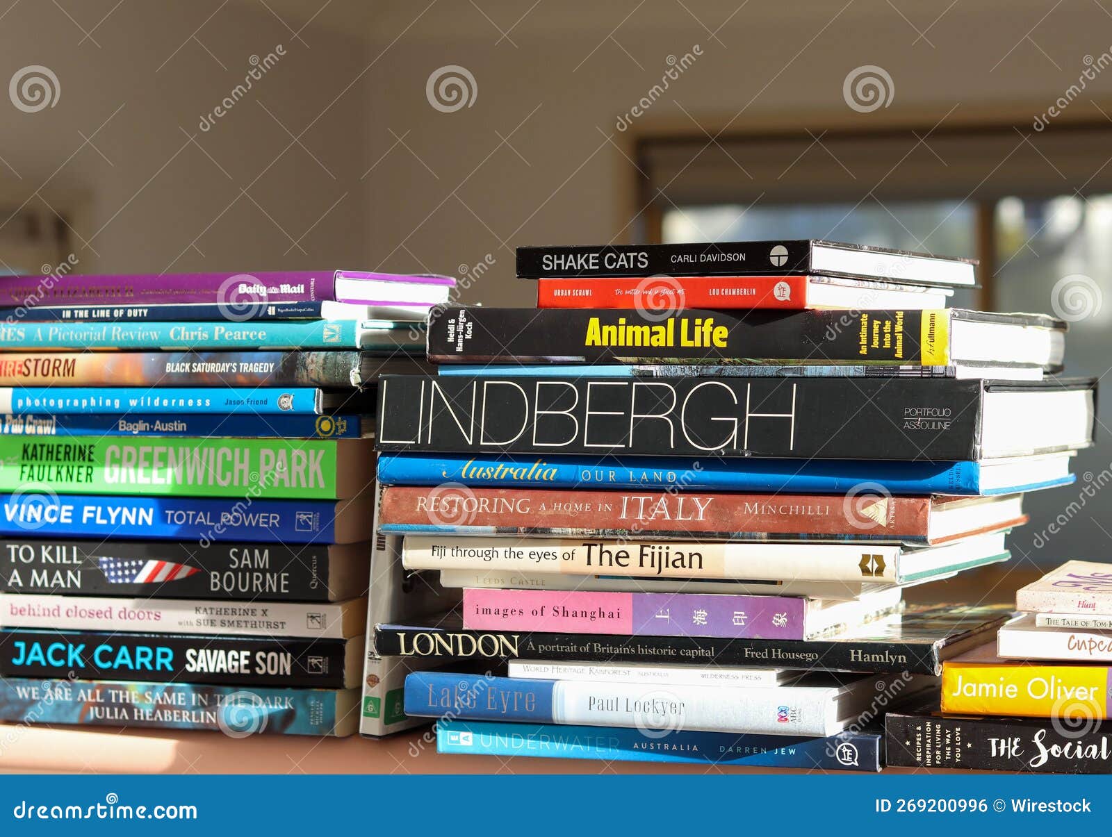 Piles of Secondhand Books on Different Topics Stacked on Top of Each ...