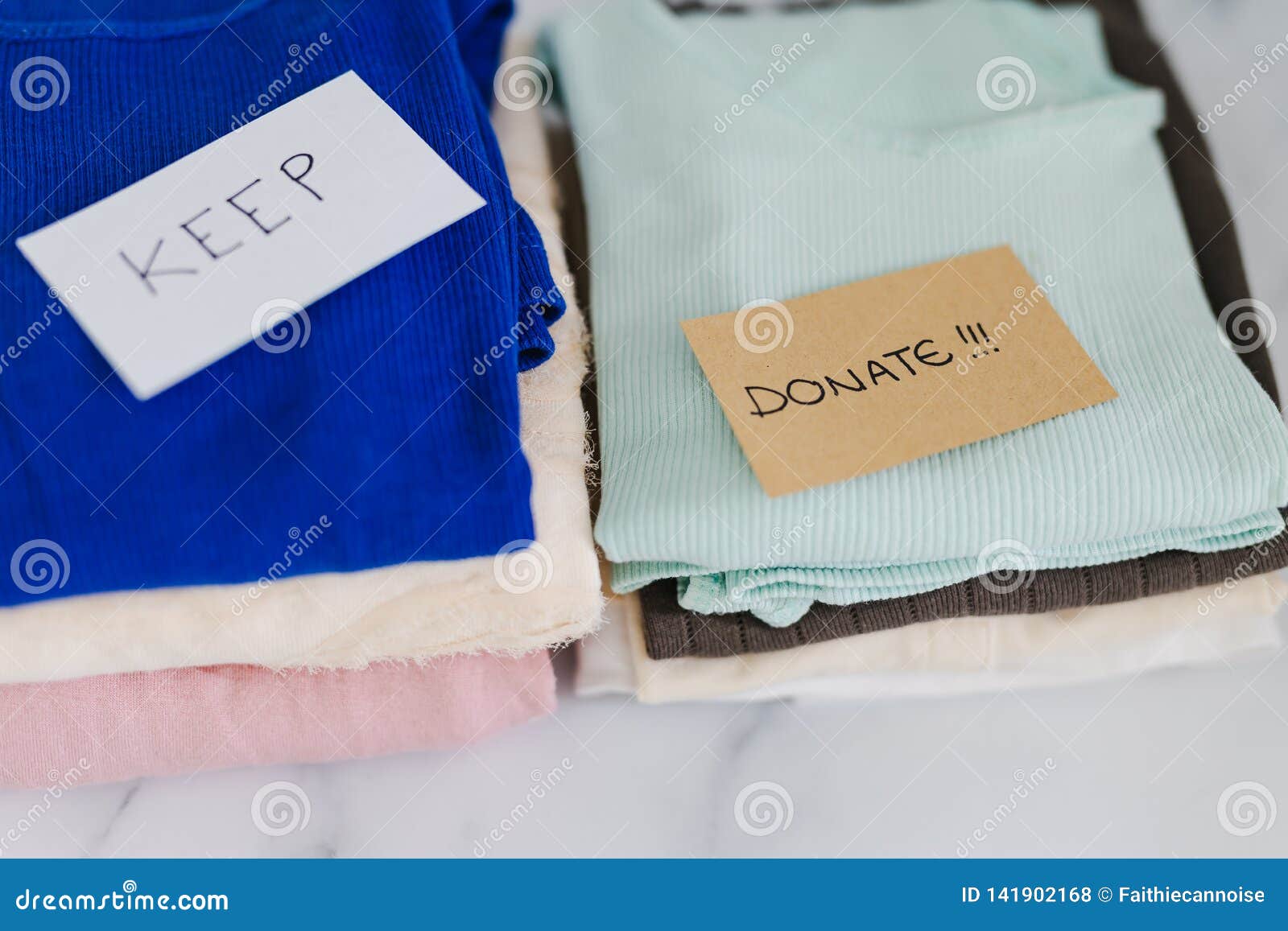 Piles of Tshirts and Clothes Being Sorted into Keep Discard and Donate ...