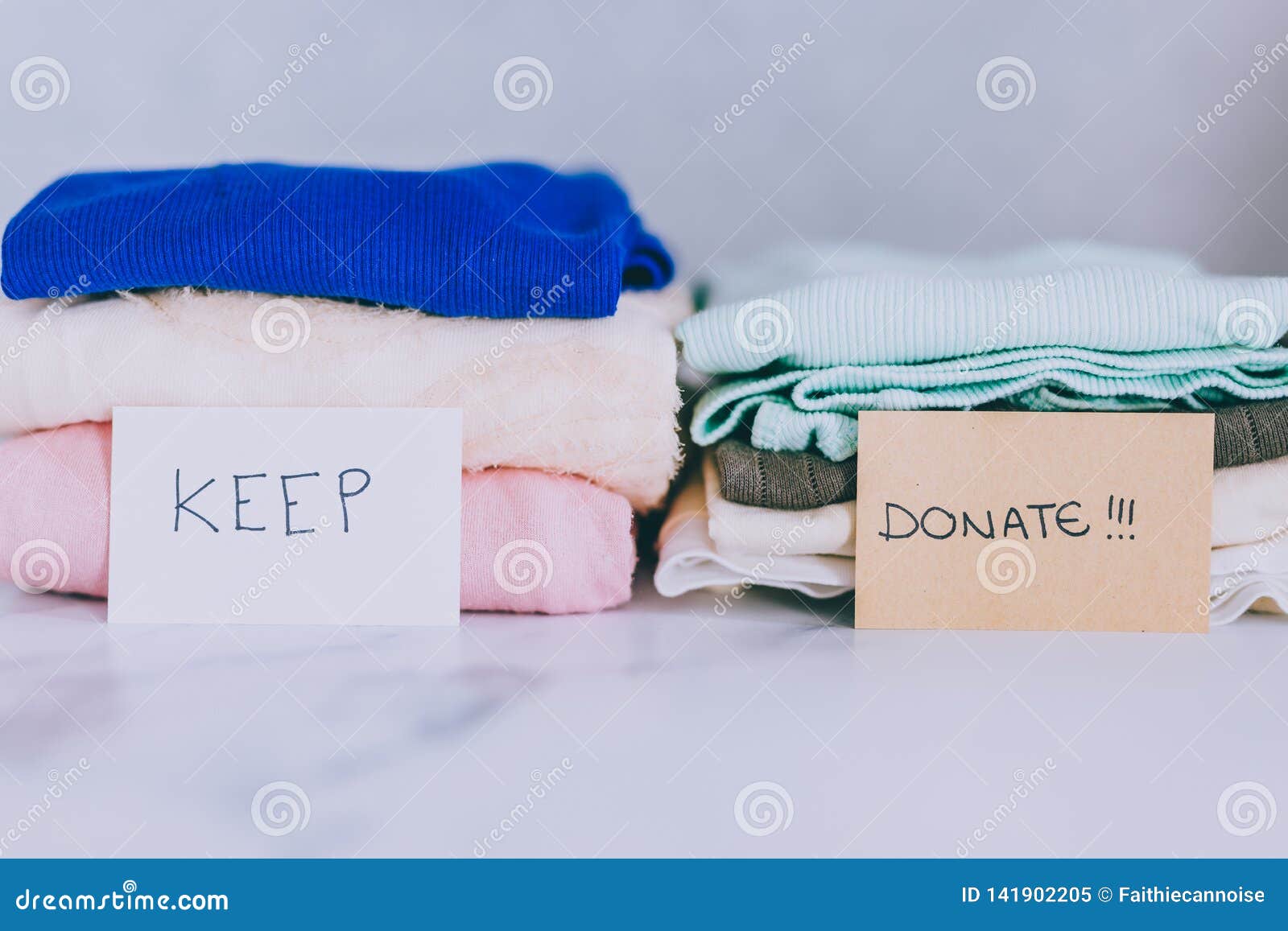 Piles of Tshirts and Clothes Being Sorted into Keep Discard and Donate ...