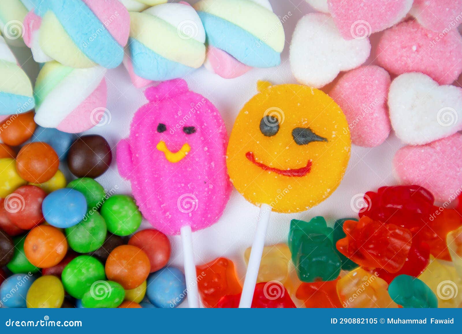 Piles of Various Kinds of Sweets and Candies with a Focus on the ...