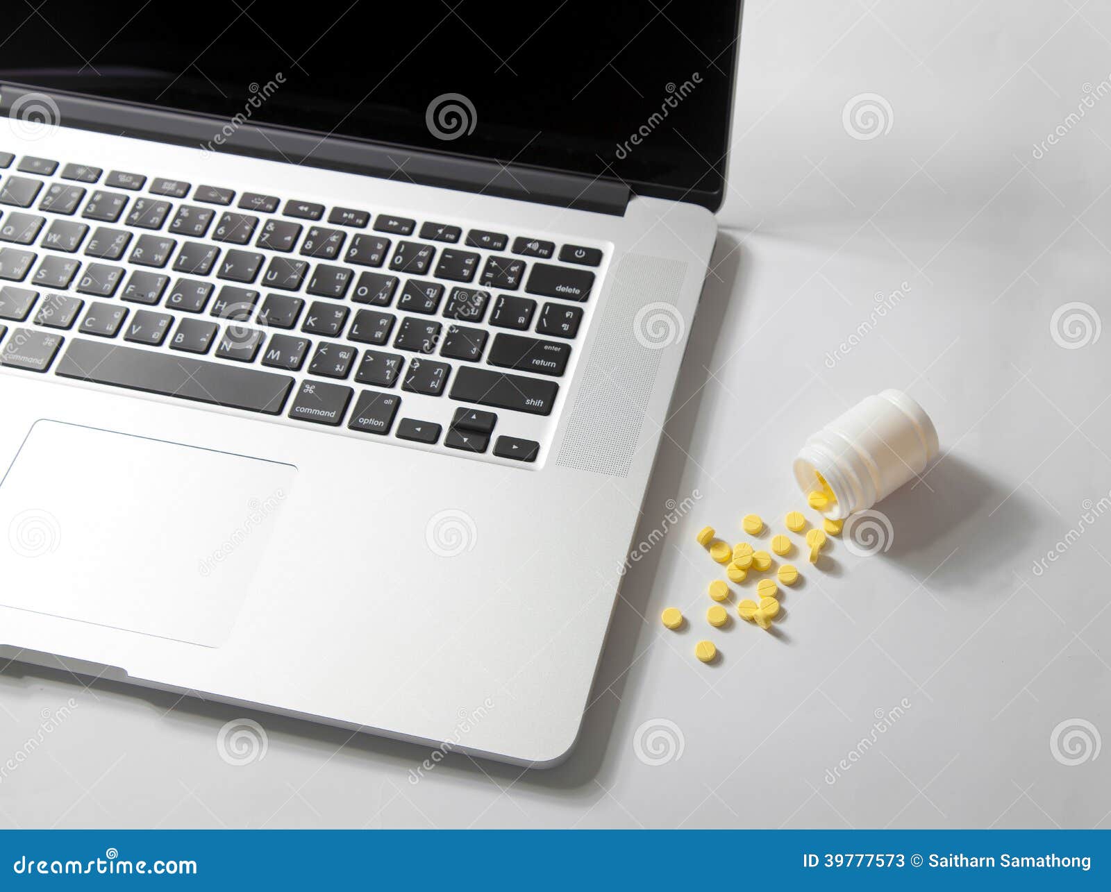 Pill bottles with computer stock image. Image of computer - 39777573