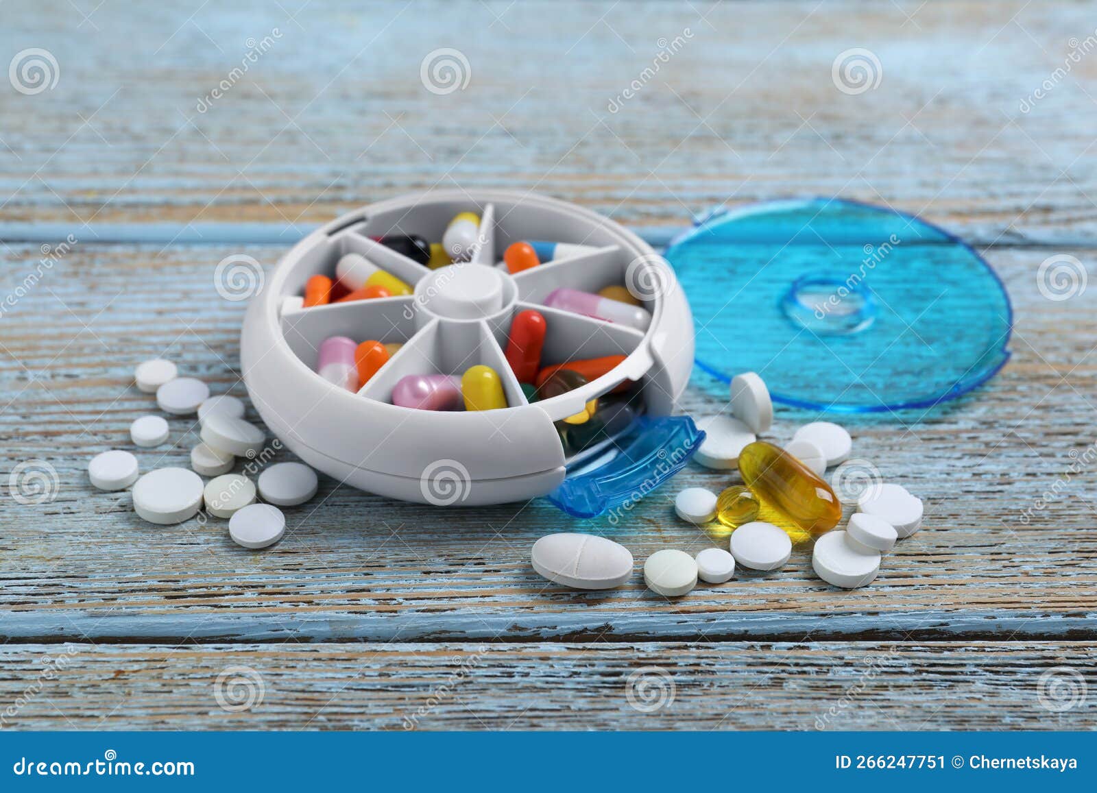 Pill Box with Medicaments on Wooden Table Stock Image - Image of remedy ...