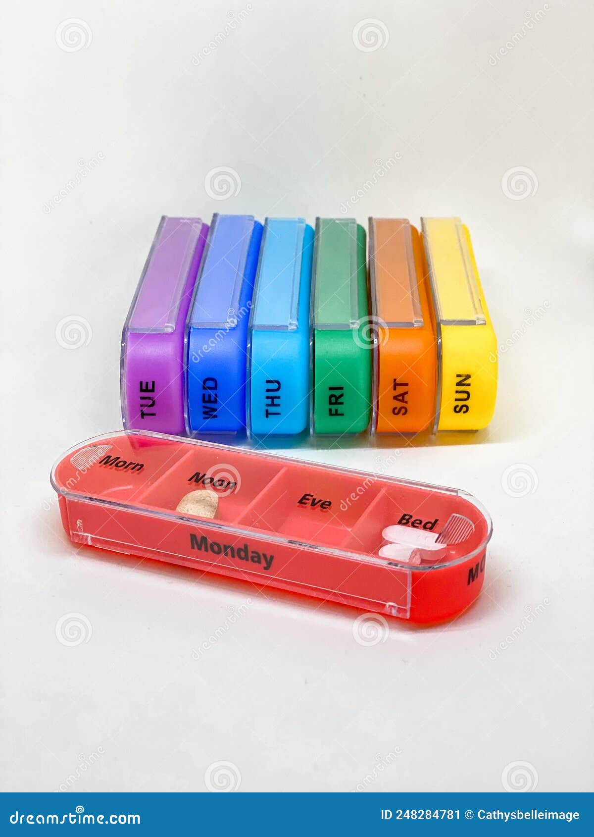 Colorful weekly Pill box stock image. Image of noon - 248284781