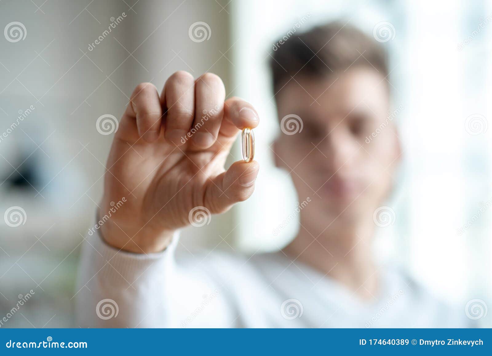 Close Up Picture of a Young Man Holding a Pill Stock Image - Image of ...