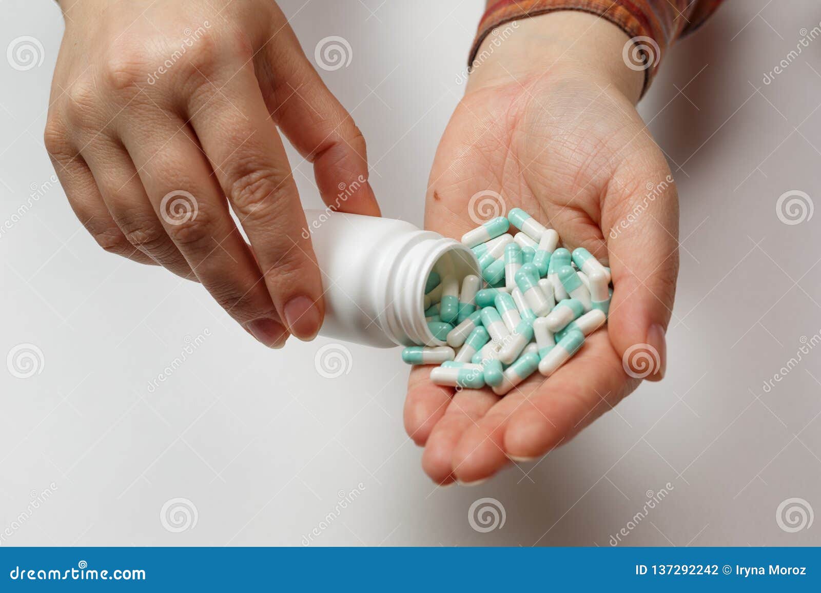 Pill in a hand isolated stock photo. Image of medicine - 137292242
