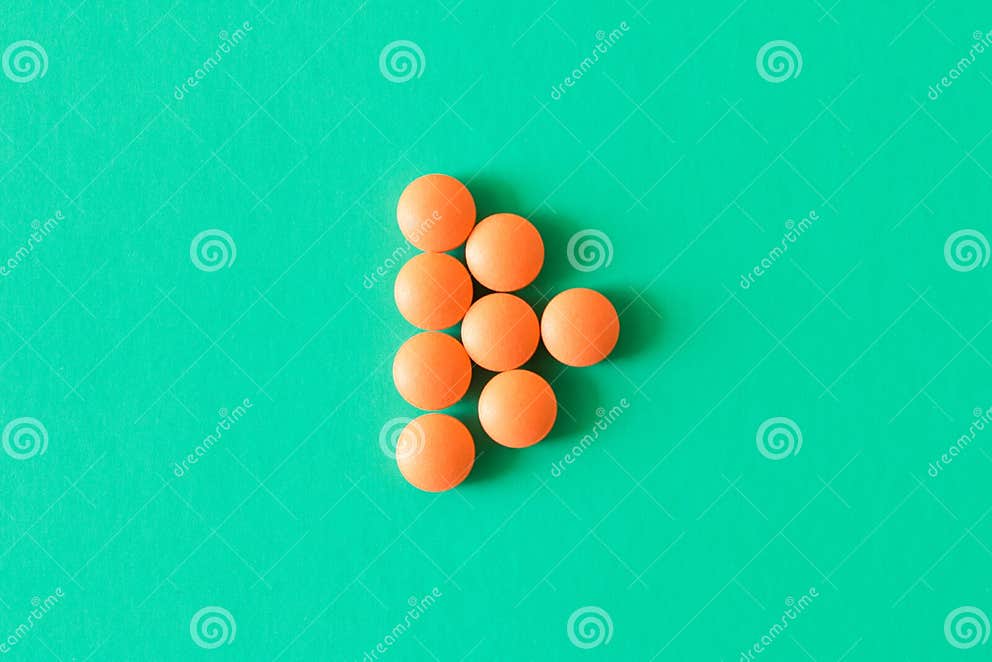 Pill Triangle . Isolated on Turquoise Background Stock Photo - Image of ...