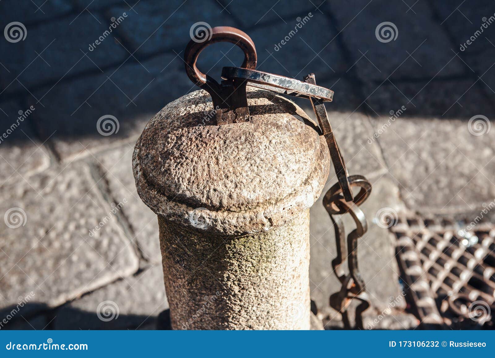 Pillar and chains stock photo. Image of closeup, pavement - 173106232