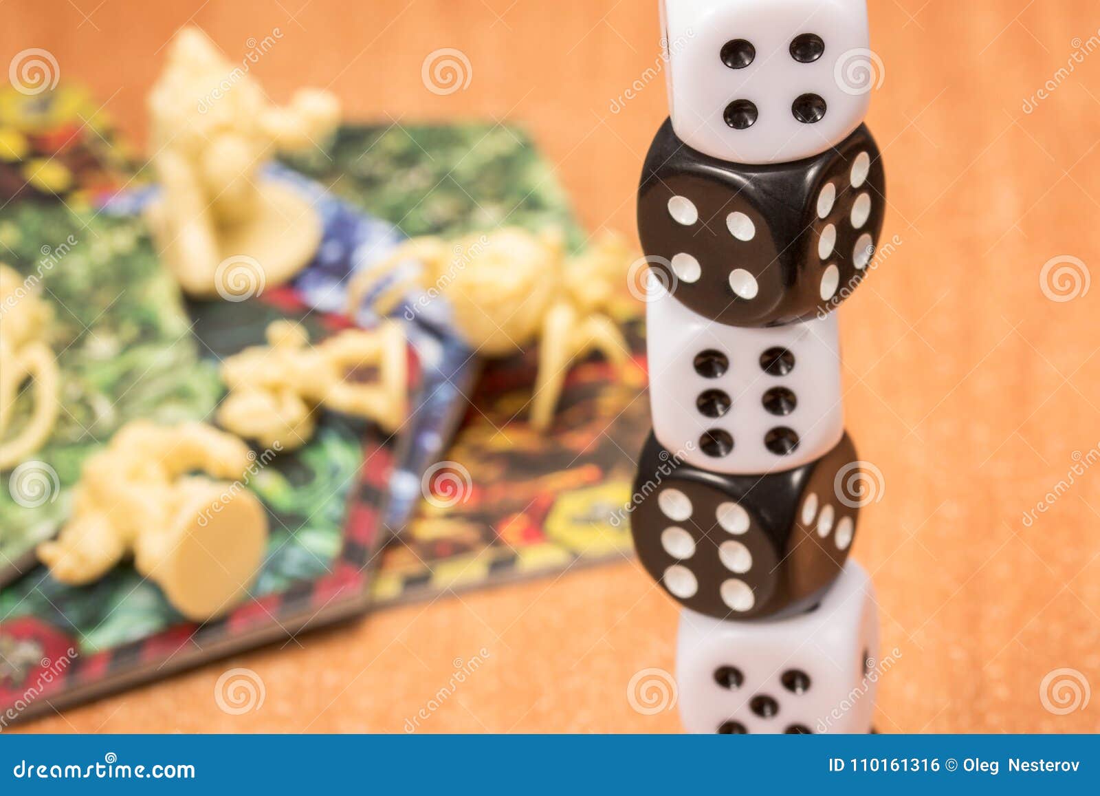 Column Of Dice And One Hand Placing Them On Top Of Each Other Stock ...