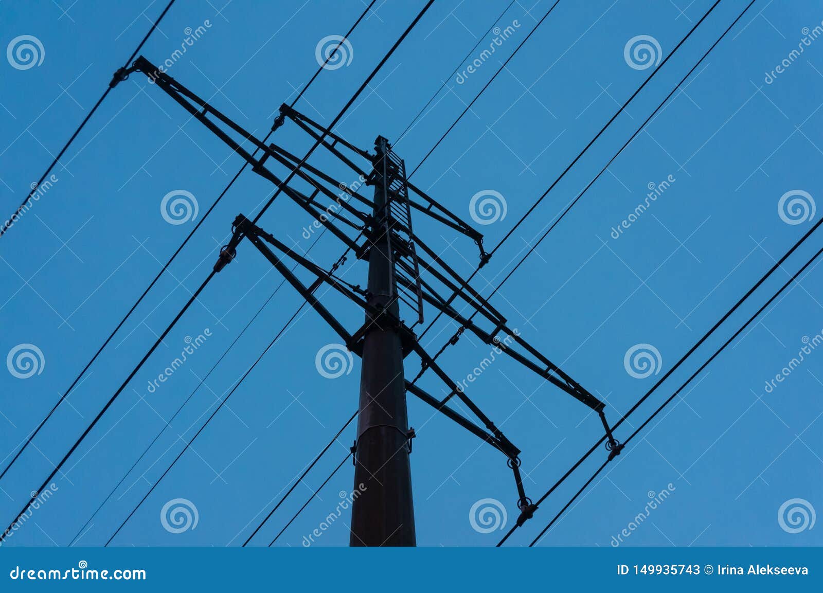Pillar High-voltage Power Lines Against the Evening Blue Sky Stock ...