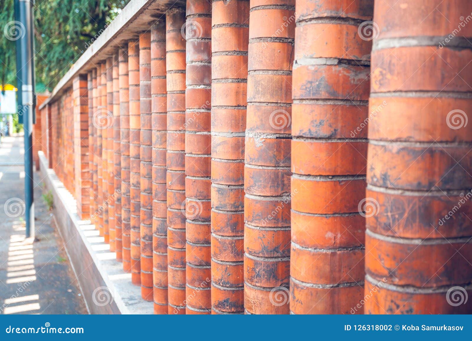 The Pillars of the Fence Made of Red Brick Shaped Stock Photo - Image ...