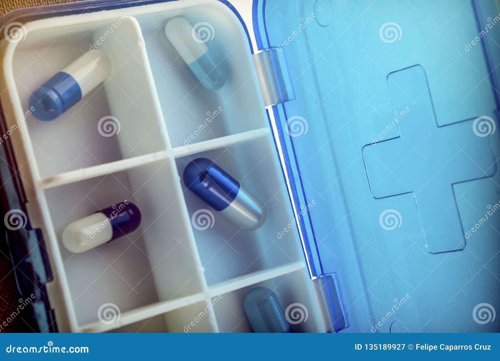 Pillbox with Capsules Blue and White Stock Image - Image of medicament ...
