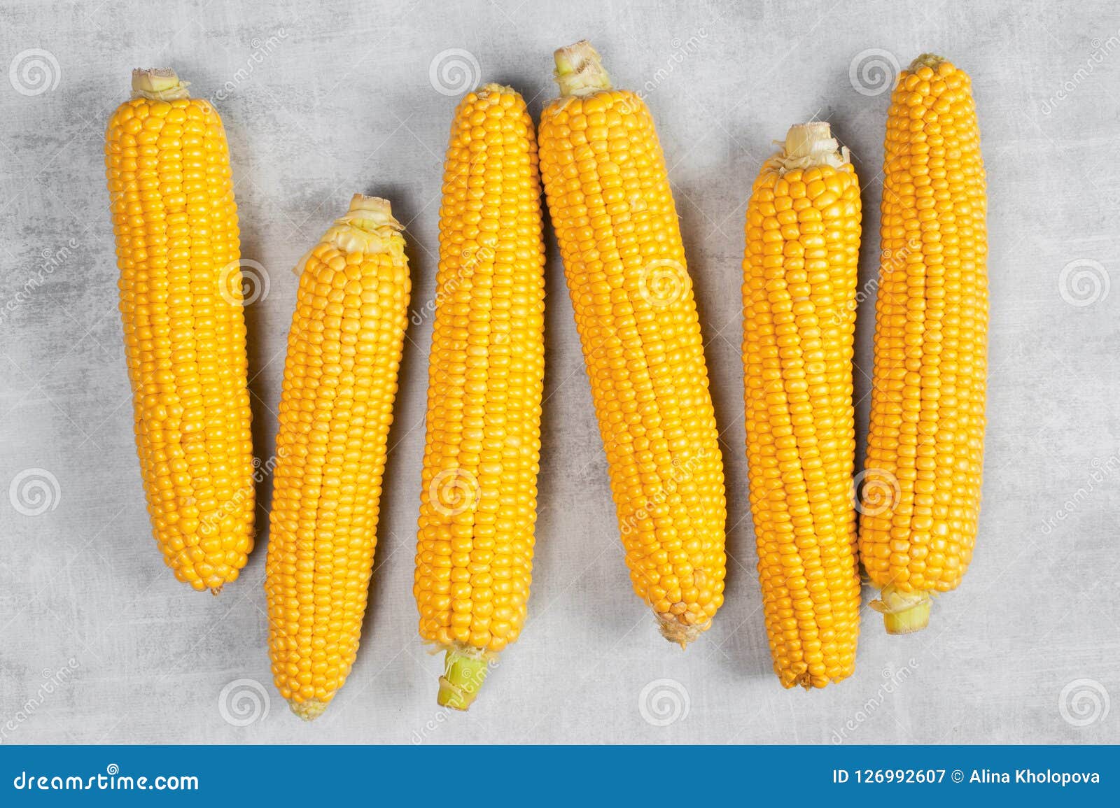 Pilled Fresh Corn Cobs on the Textured Grey Table Stock Image - Image ...