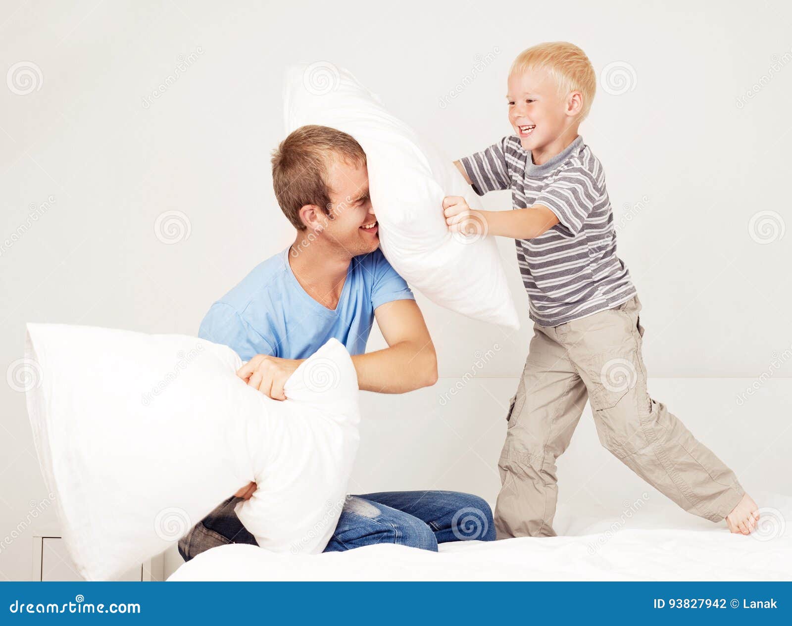 Pillow fight at home stock photo. Image of child, playful - 93827942