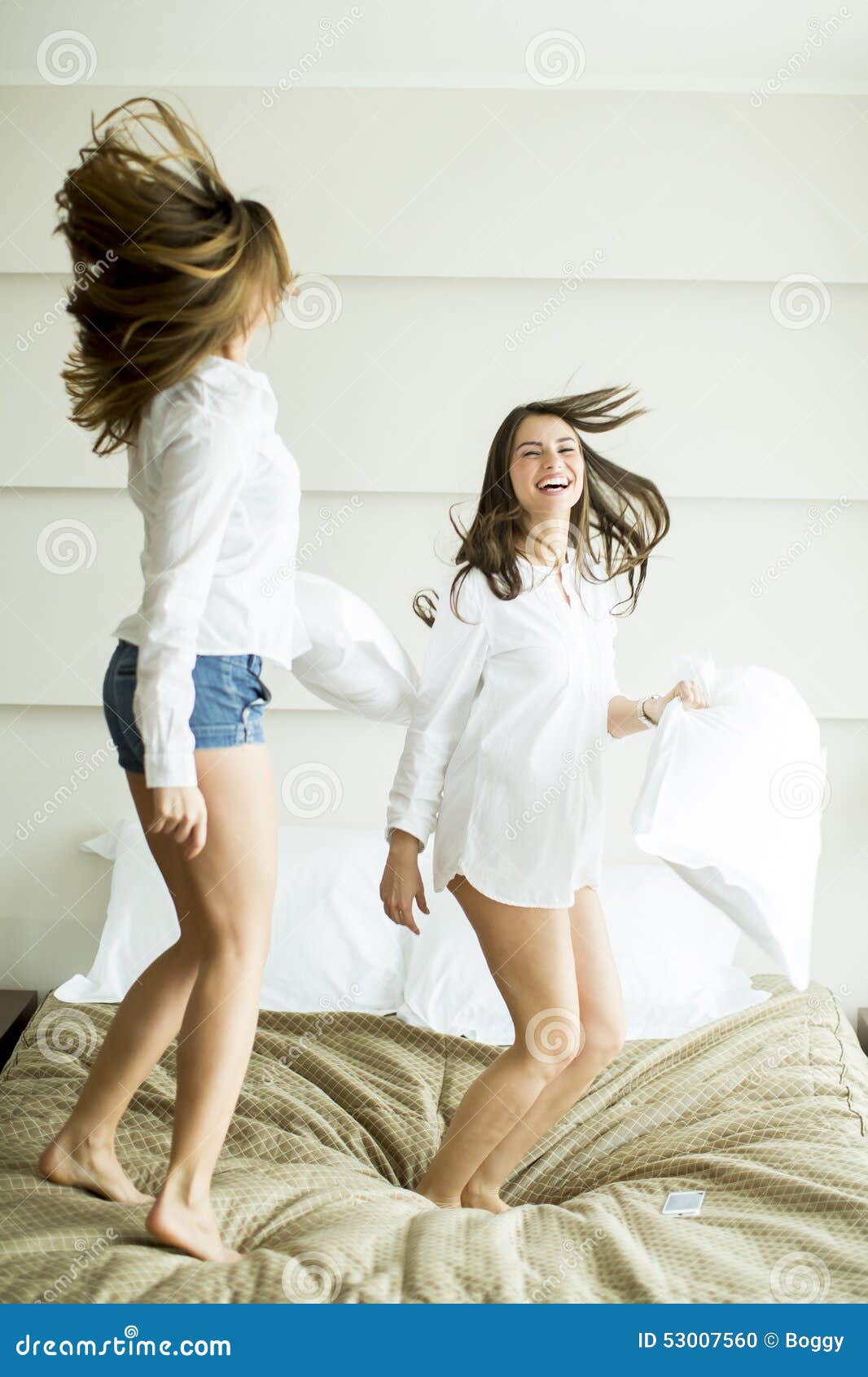 Pillow fighting stock photo. Image of home, bedroom, fight - 53007560