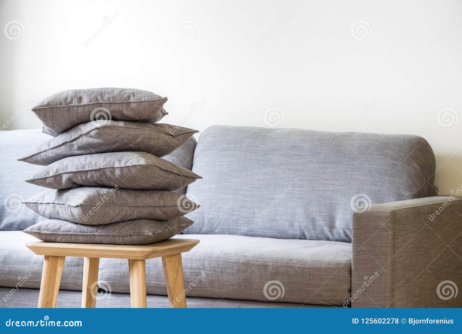 Pillows Stacked in a Pile on a Table. Stock Photo - Image of cushion ...