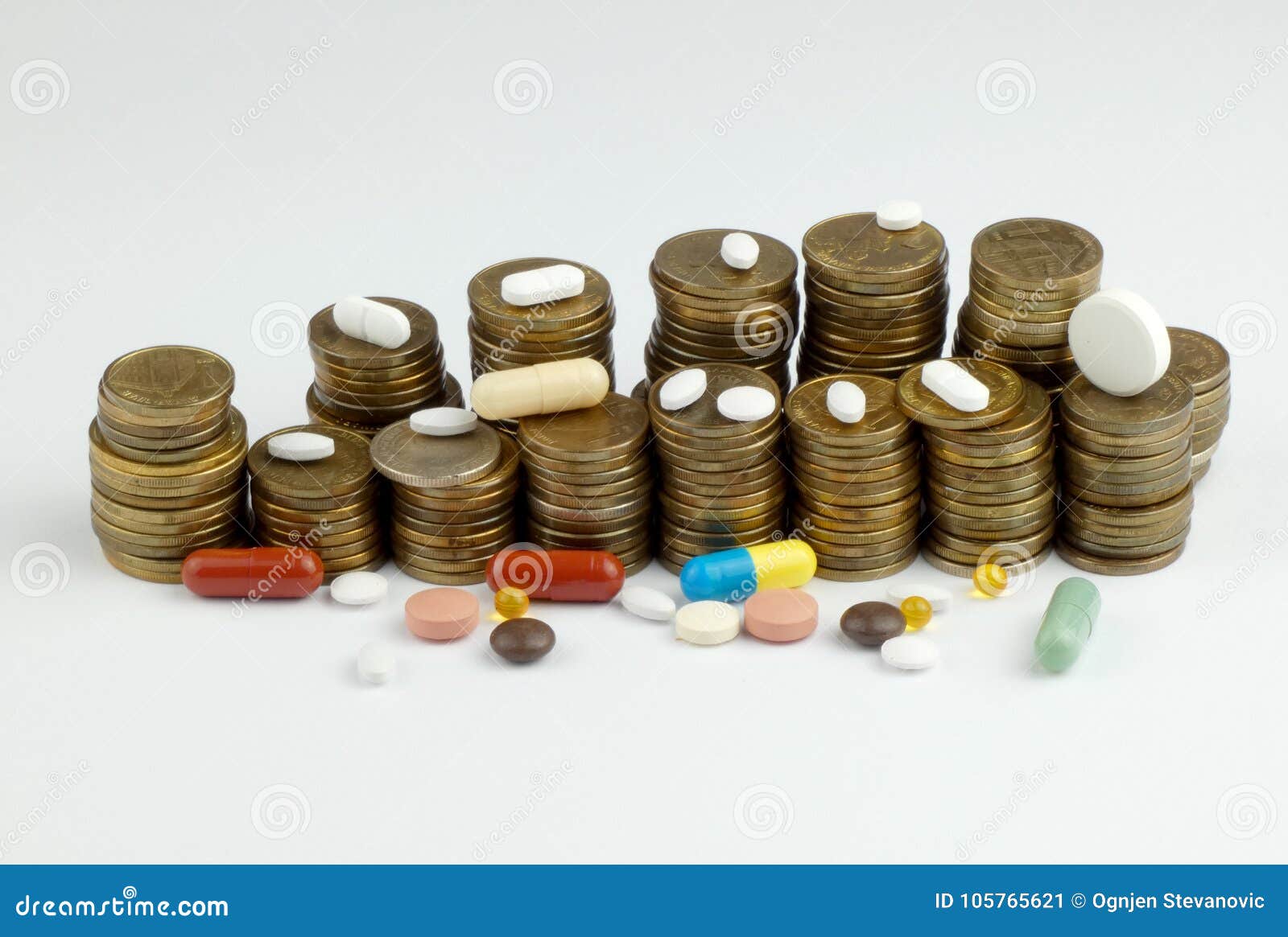 Pills and coins on white stock image. Image of background - 105765621