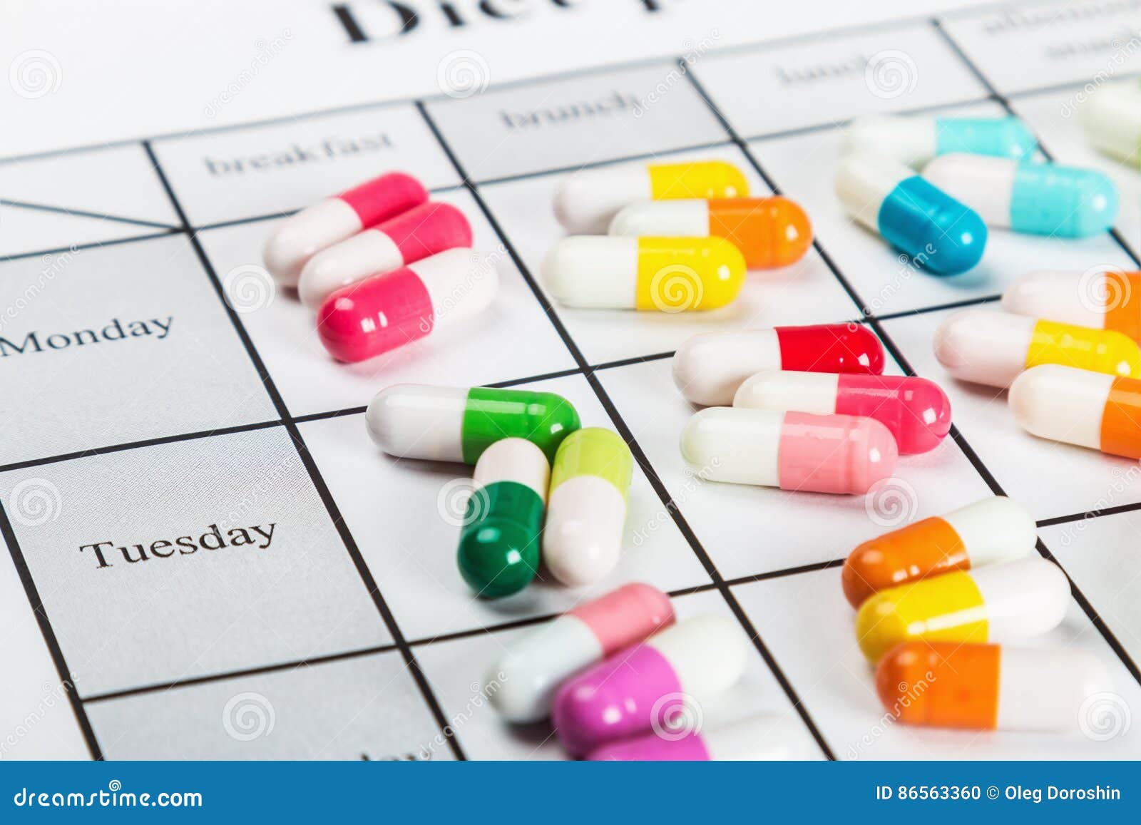 Pills of Different Colors on a Calendar Stock Photo - Image of service ...