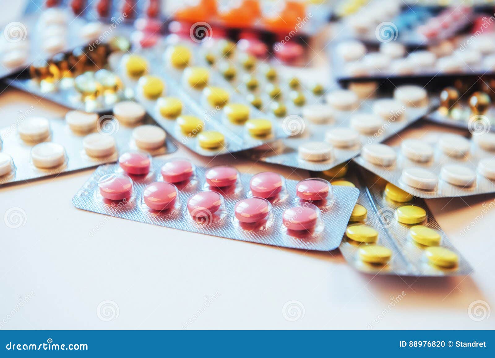 Pills of Different Colors Lie on the Surface in a Sealed Package. Stock ...