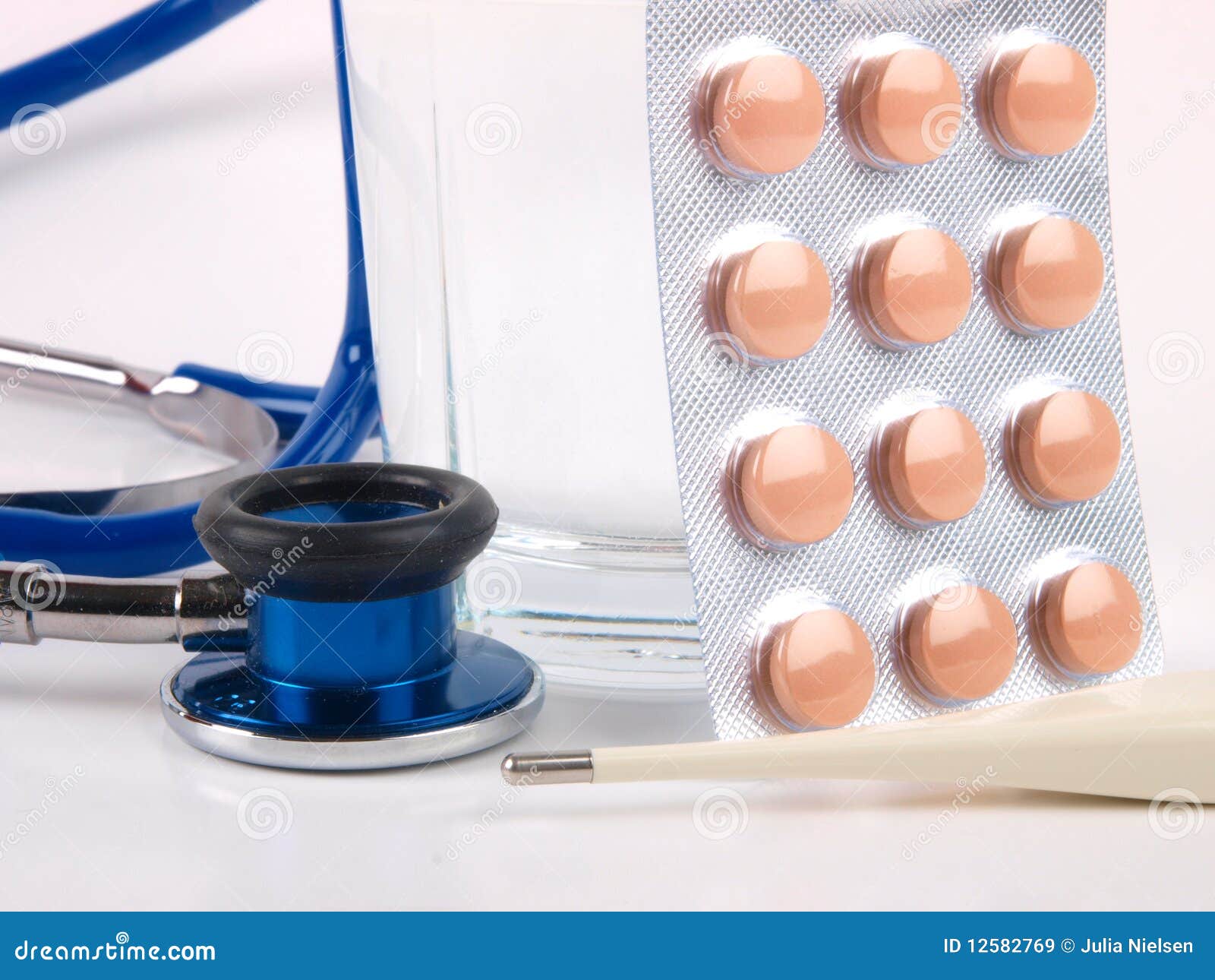 Pills on doctors table stock image. Image of capsule - 12582769