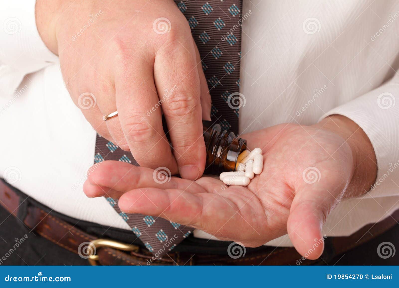 Pills in man hand stock photo. Image of male, mouth, closeup - 19854270
