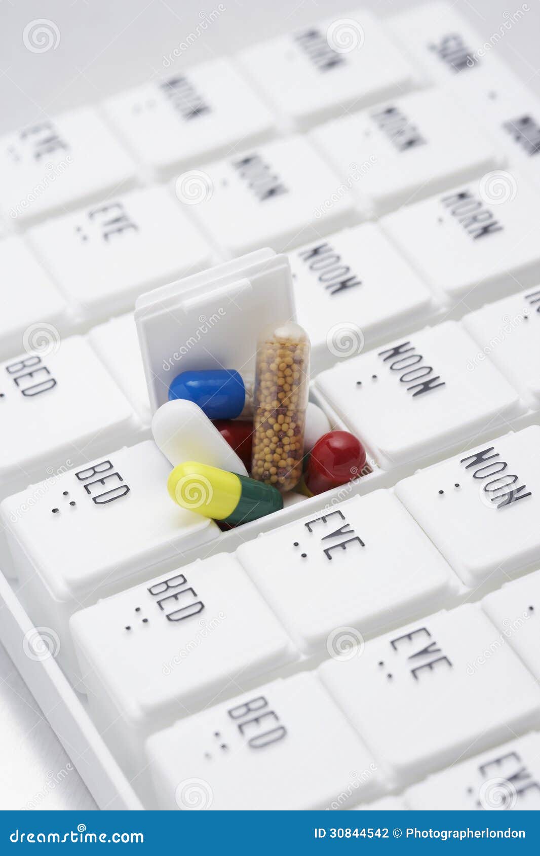 Pills in open container stock photo. Image of pill, london - 30844542