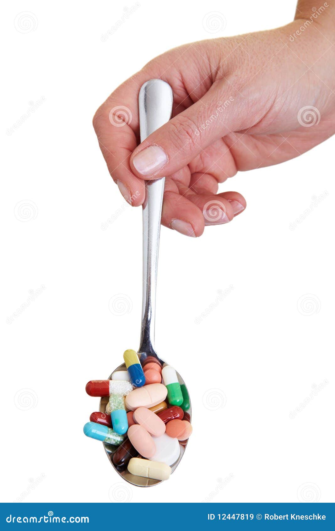 Pills on a spoon stock image. Image of medication, food - 12447819