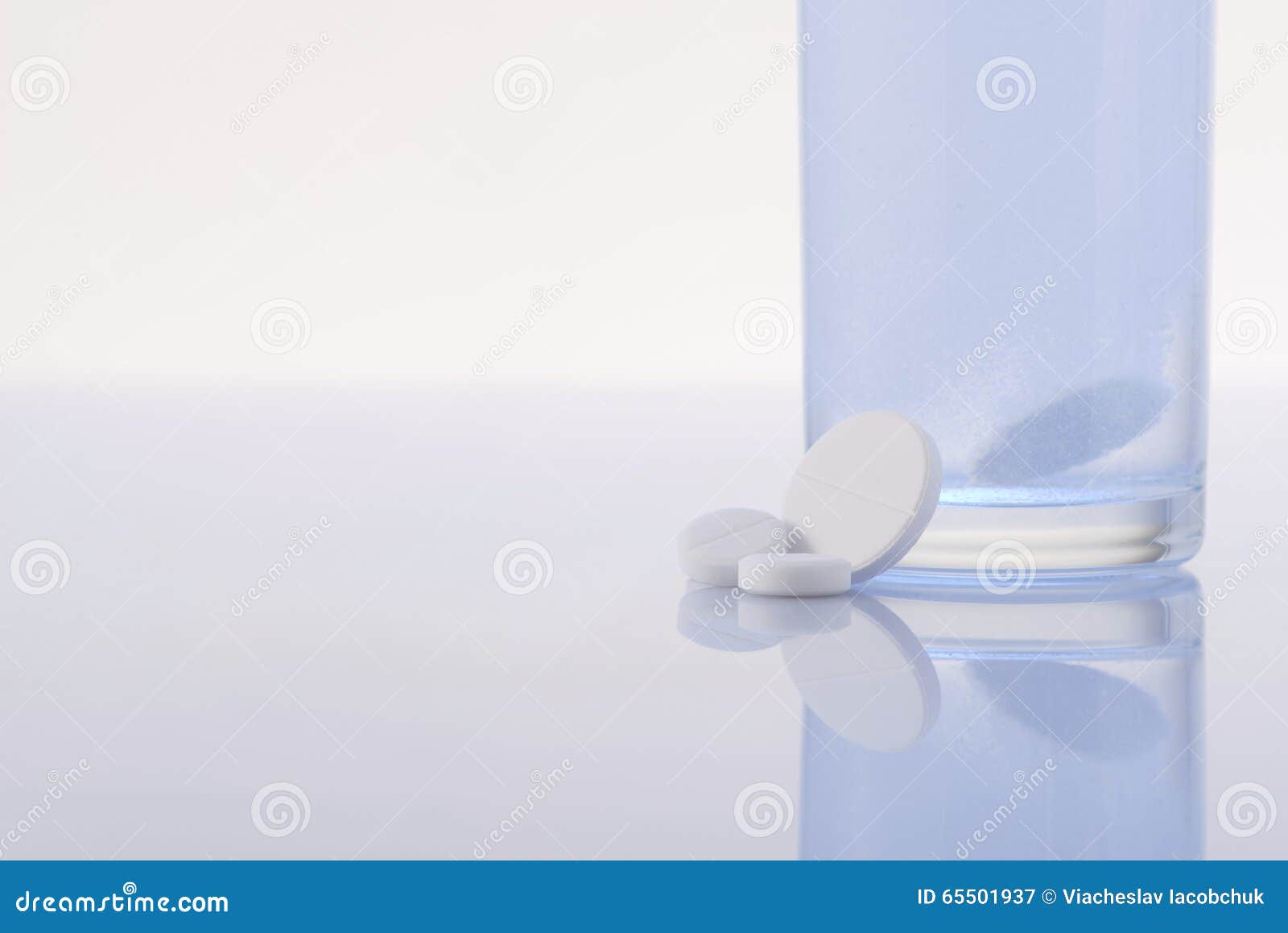 Pills and water in a glass stock image. Image of essential - 65501937