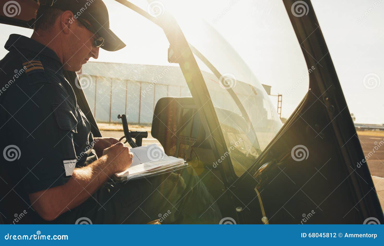 Pilot Checking the Flight Manual before a Take Off Stock Photo - Image ...