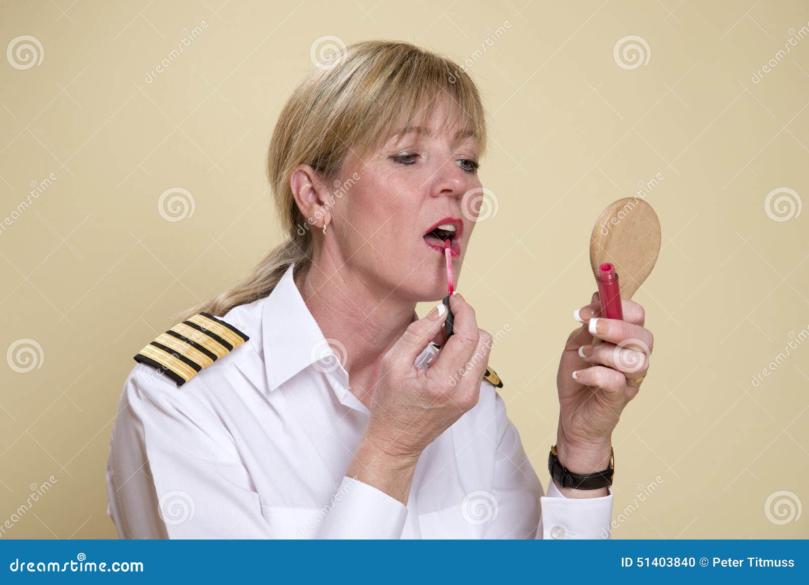 Pilot Checking Out Her Makeup Stock Photo - Image of aviation, grooming ...