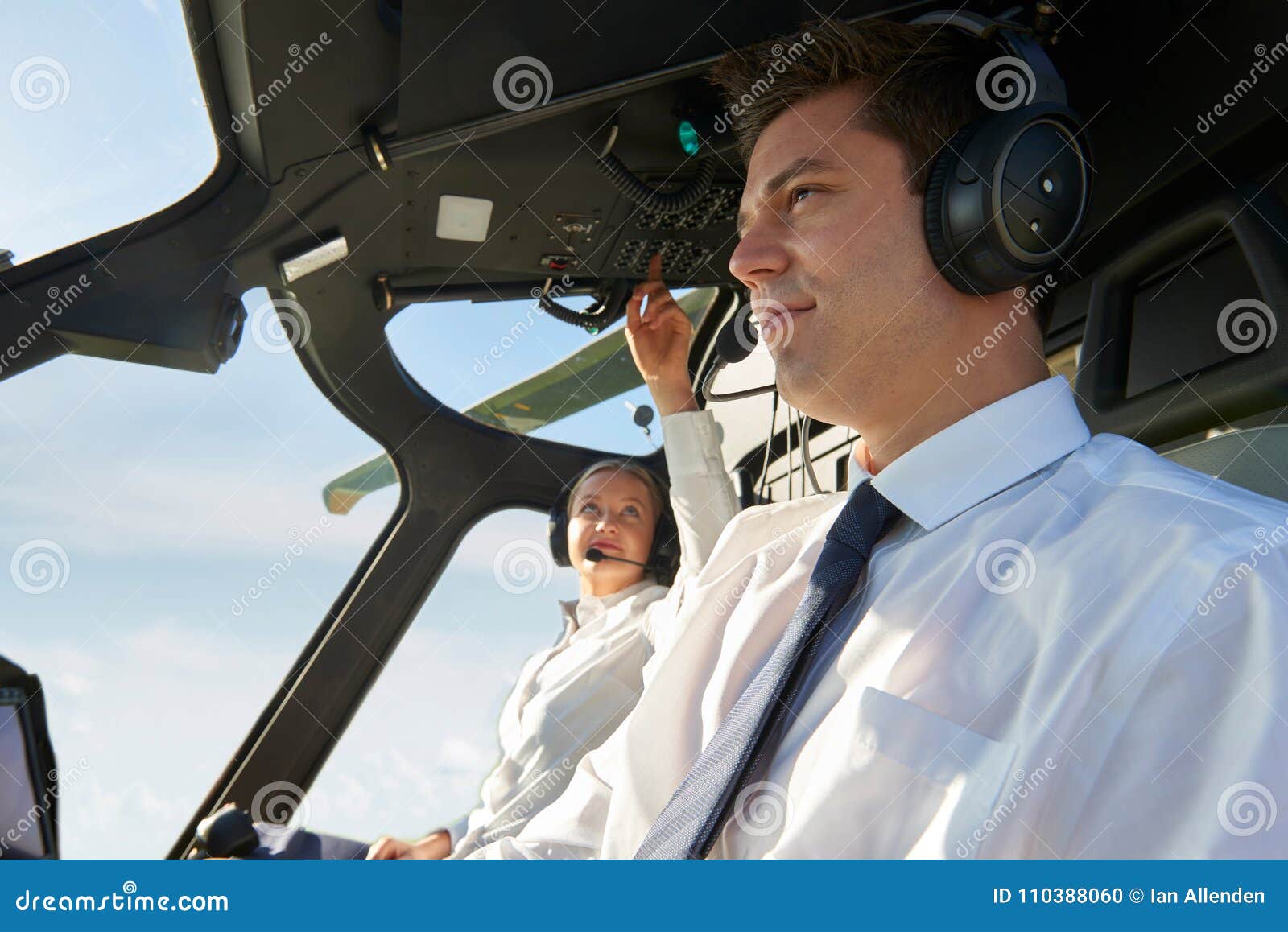 Pilot and Co Pilot in Cockpit of Helicopter Stock Photo - Image of ...
