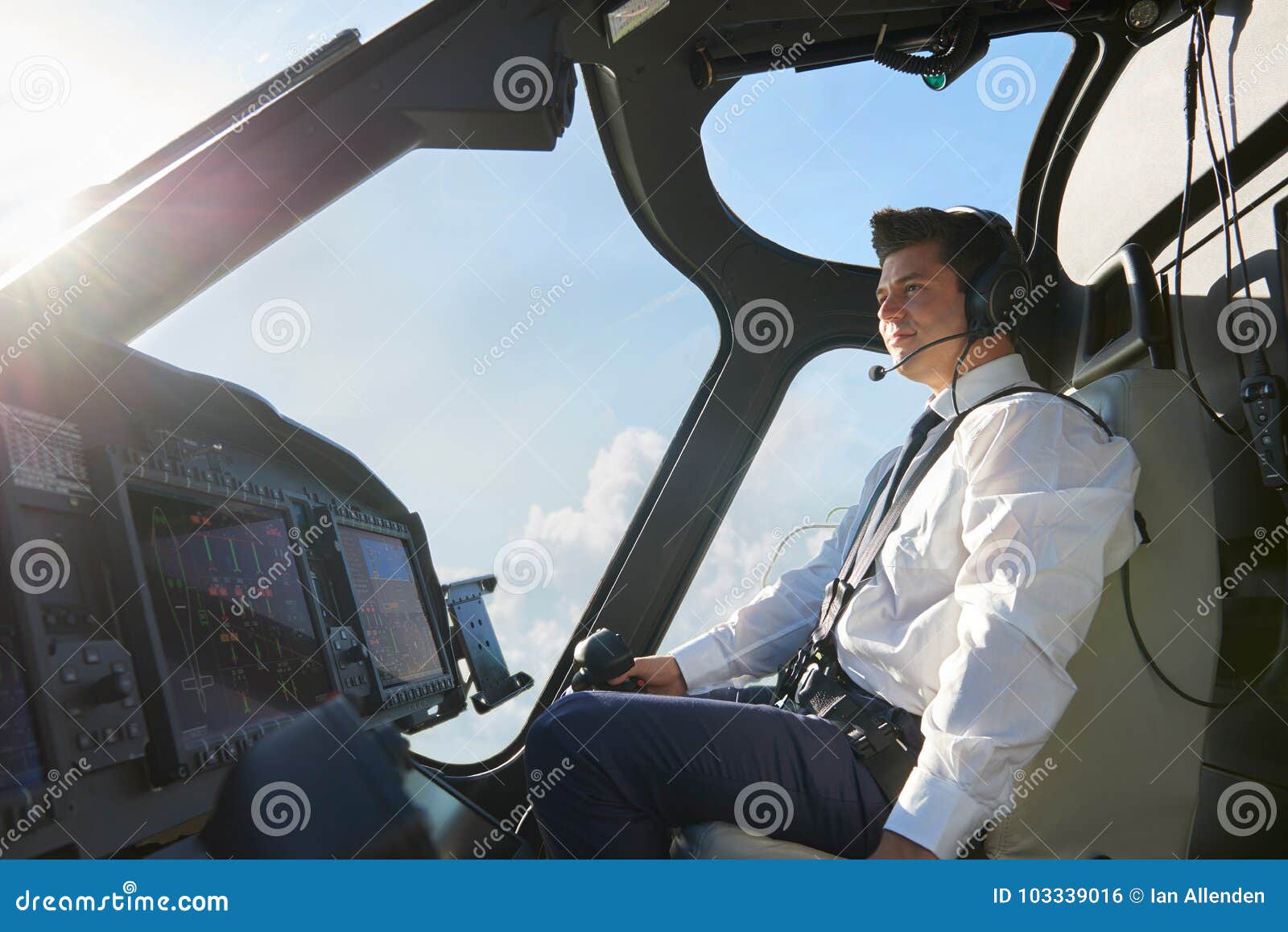 Pilot in Cockpit of Helicopter during Flight Stock Photo - Image of ...
