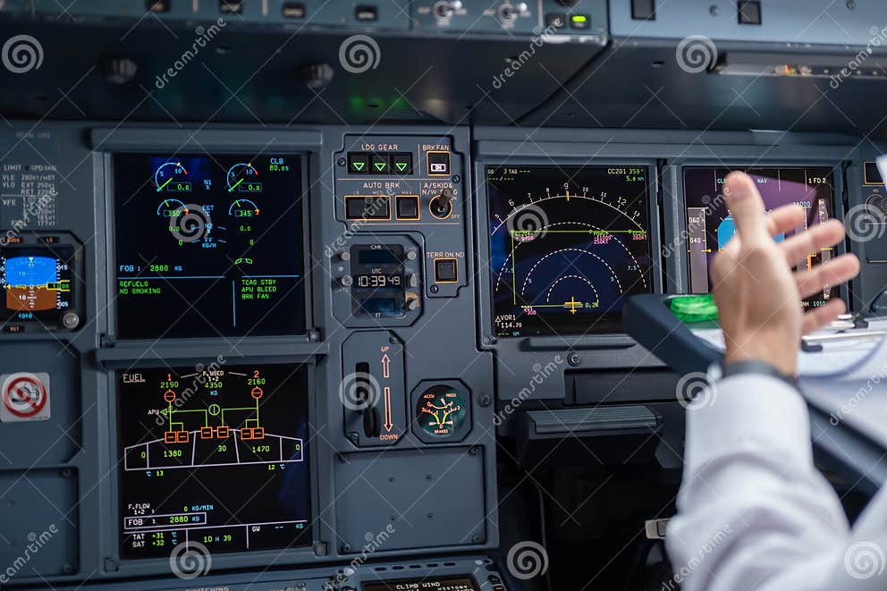 Pilot in Command Setting Control Panel in Cockpit Stock Photo - Image ...