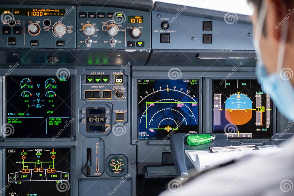 Pilot in Command Setting Control Panel in Cockpit Stock Photo - Image ...
