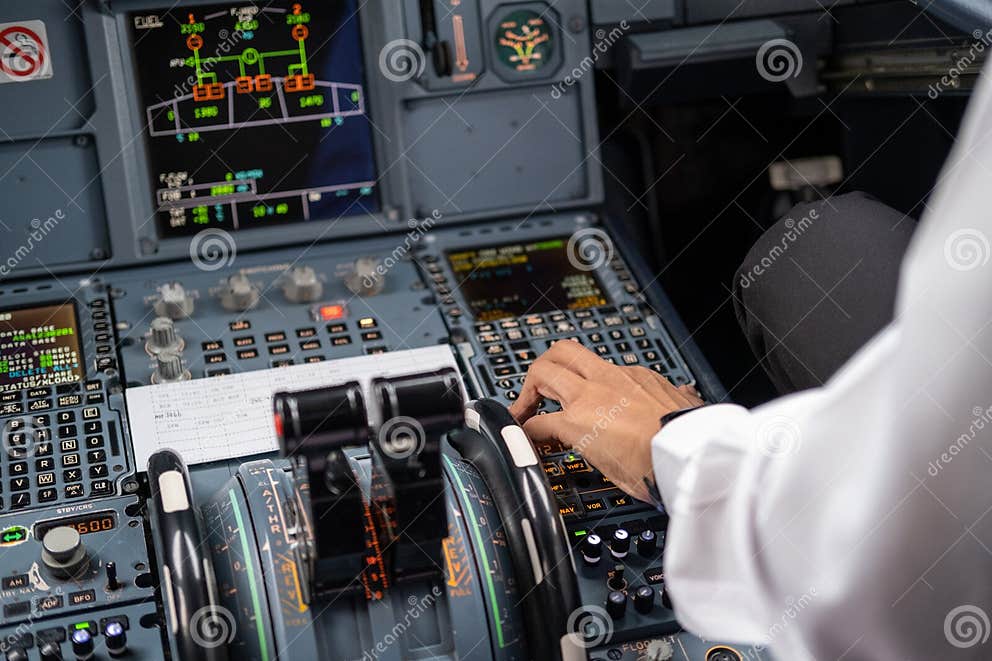 Pilot in Command Setting Control Panel in Cockpit Stock Photo - Image ...