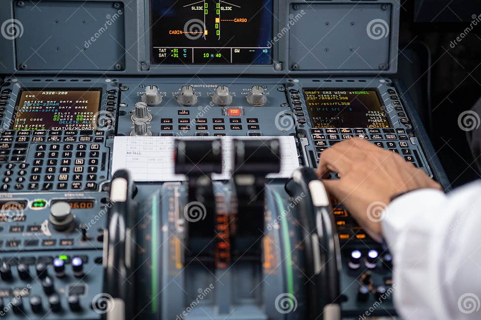 Pilot in Command Setting Control Panel in Cockpit Stock Photo - Image ...