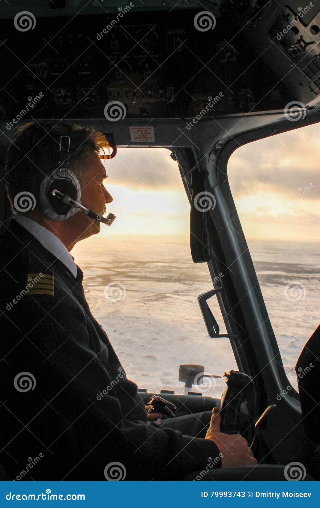 Pilot at the Controls of a Helicopter Editorial Stock Photo - Image of ...