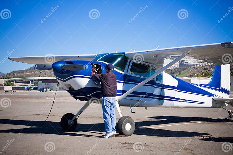 Pilot Doing Preflight of Light Aircraft Stock Image - Image of aircraft ...