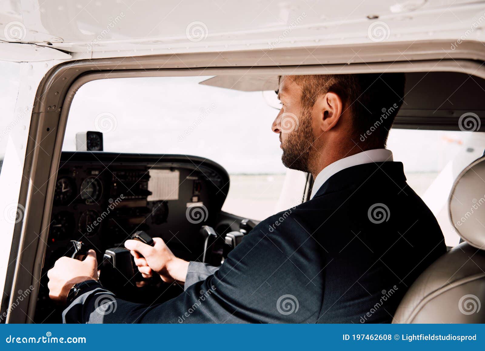 Pilot in Formal Wear Sitting in Plane Stock Photo - Image of outdoors ...
