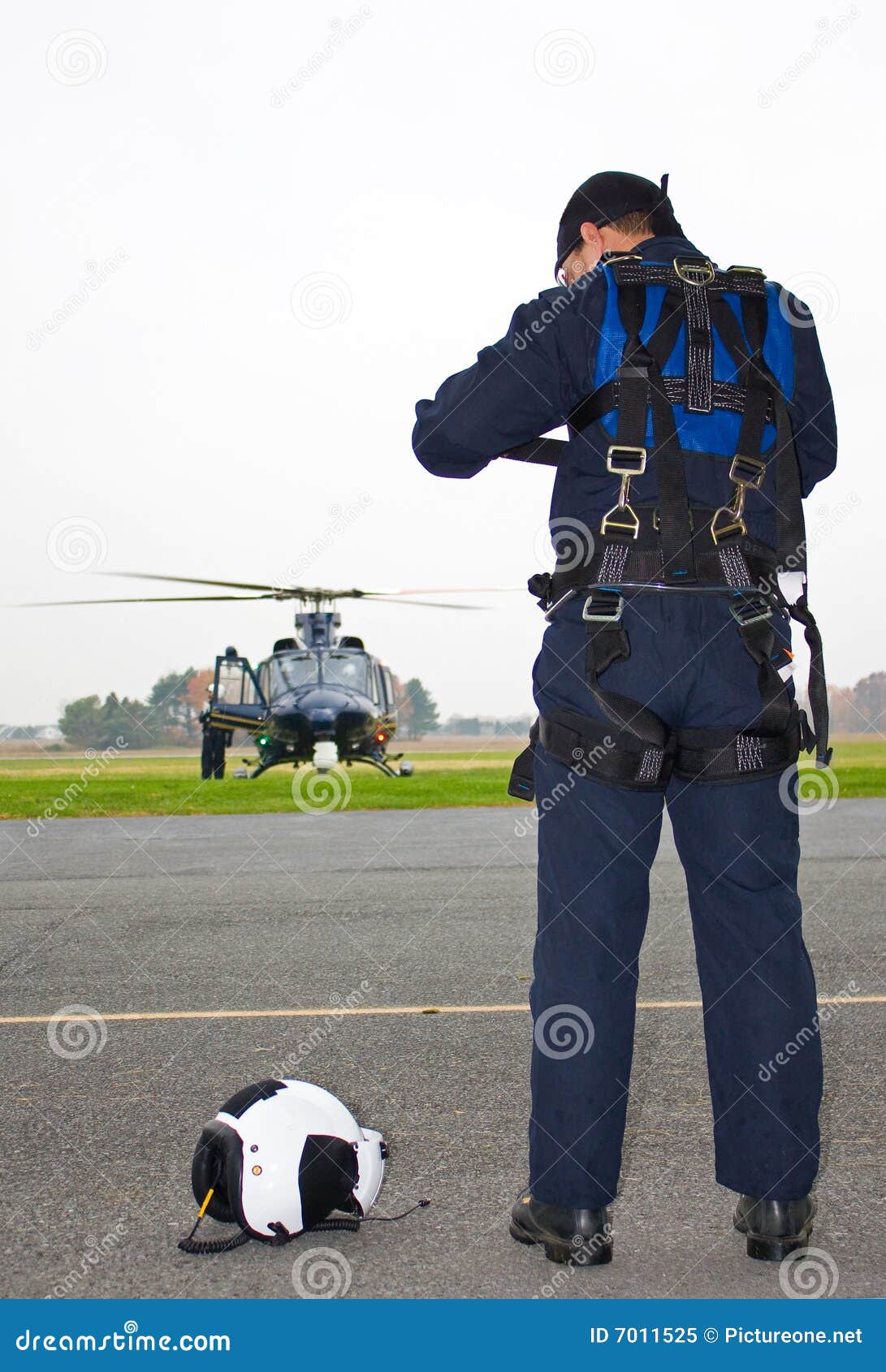 Pilot near helicopter stock image. Image of outside, rotors - 7011525