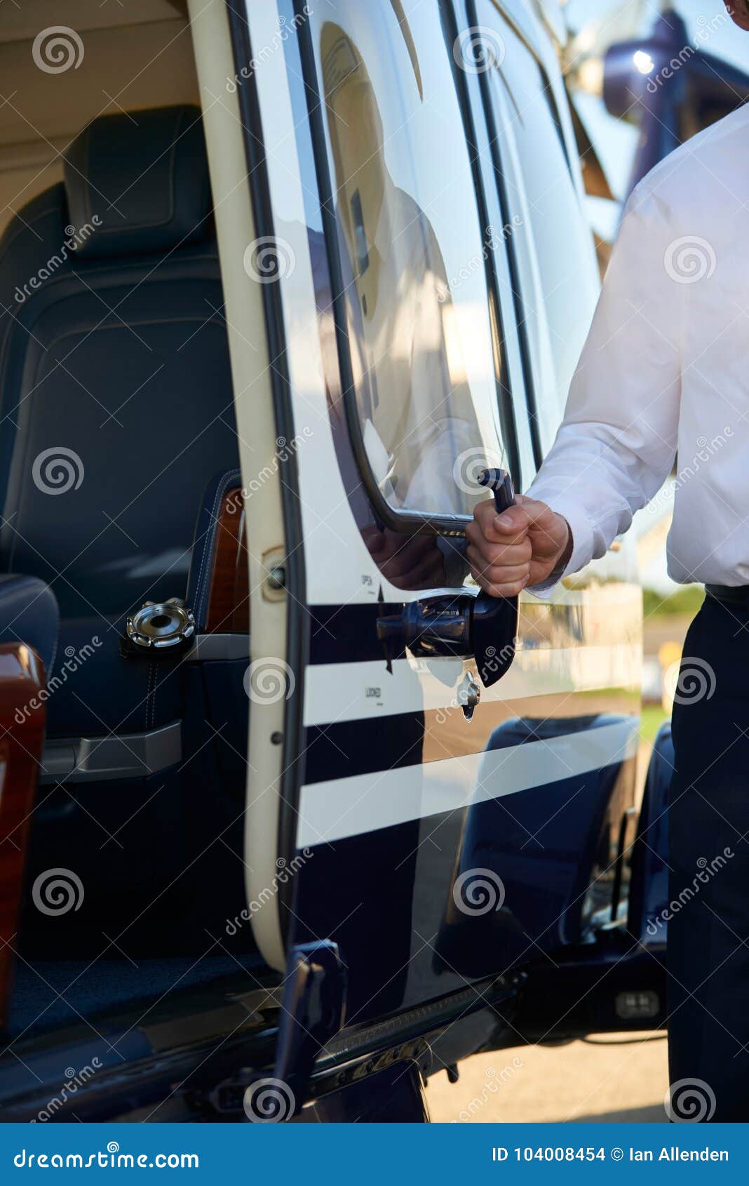 Close Up of Pilot Opening Helicopter Cabin Door Stock Photo - Image of ...