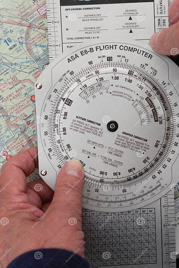 Pilot Plots a Flight on a Sectional Map for a Vector from One Airport ...
