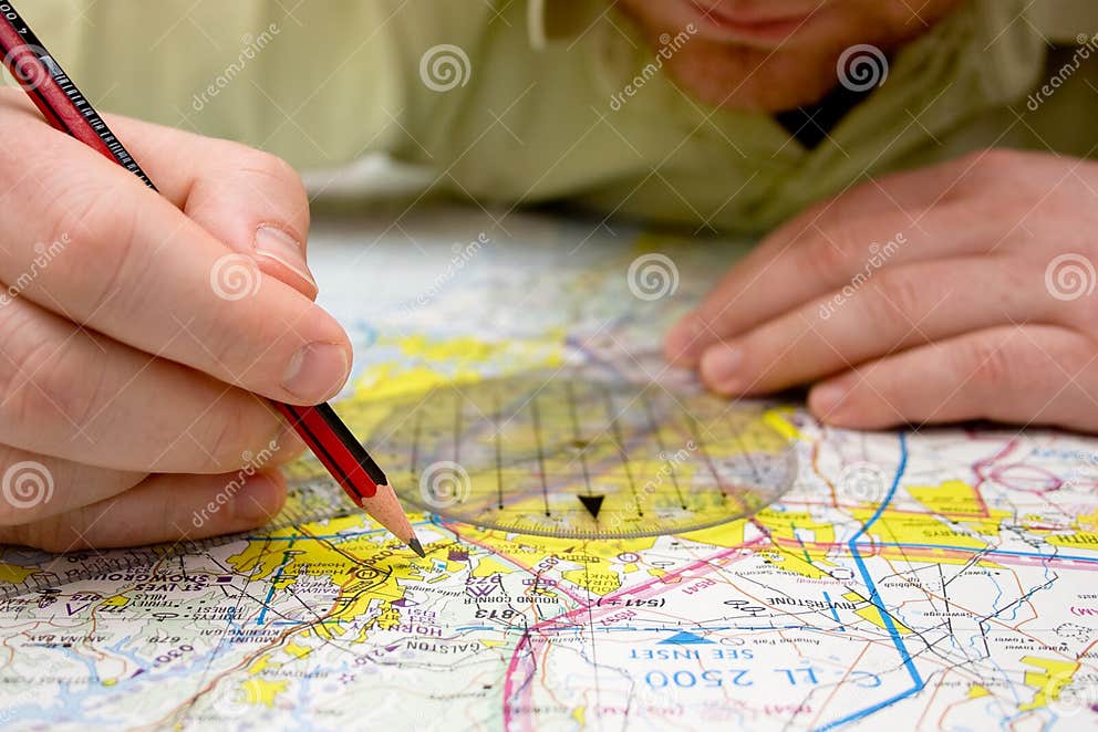 Pilot Plotting a Course on a Map Stock Photo - Image of flight, pilot ...