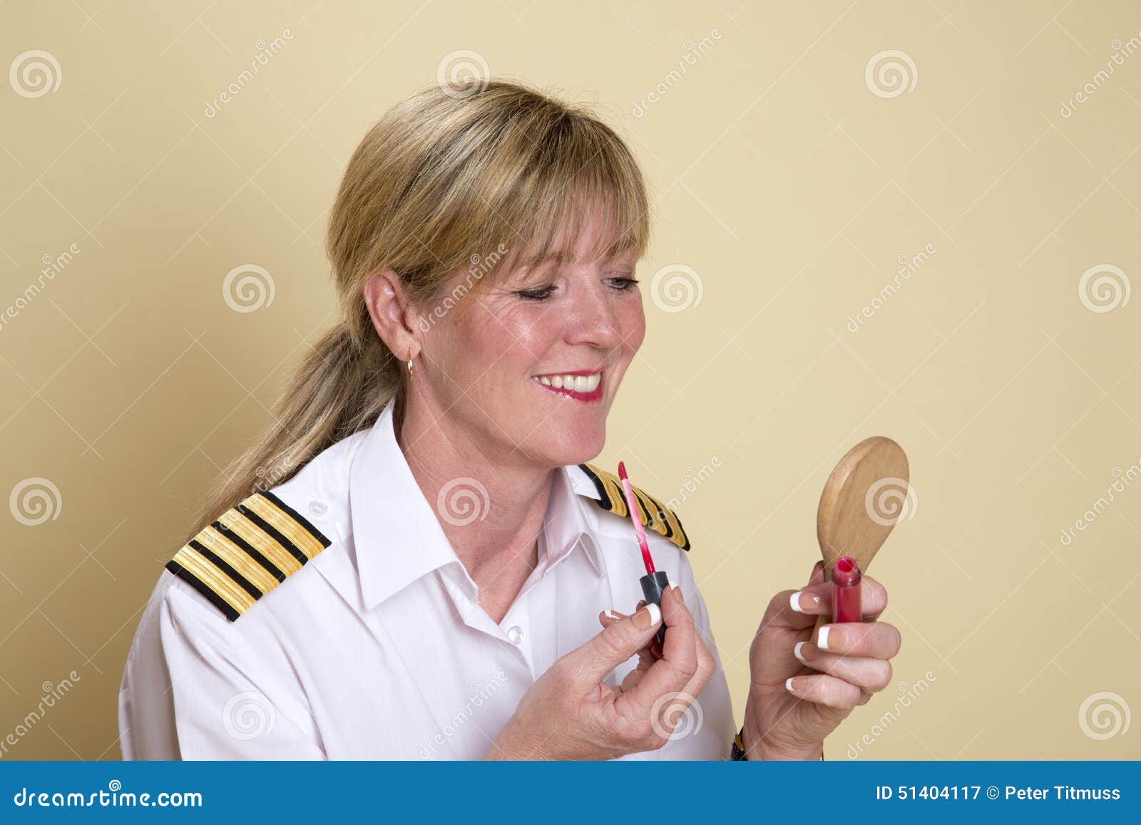 Pilot putting on make up stock image. Image of dressed - 51404117