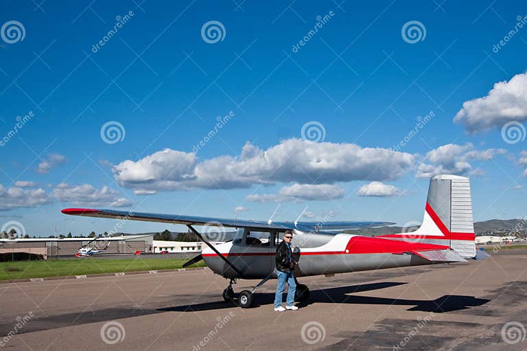 Pilot and small airplane stock photo. Image of propeller - 26406208
