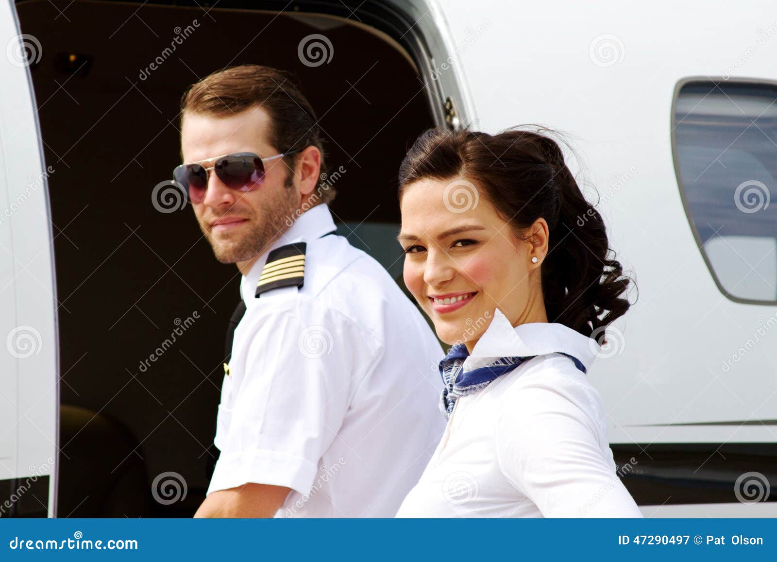 Pilot and Stewardess Entering Plane Stock Image - Image of travel ...