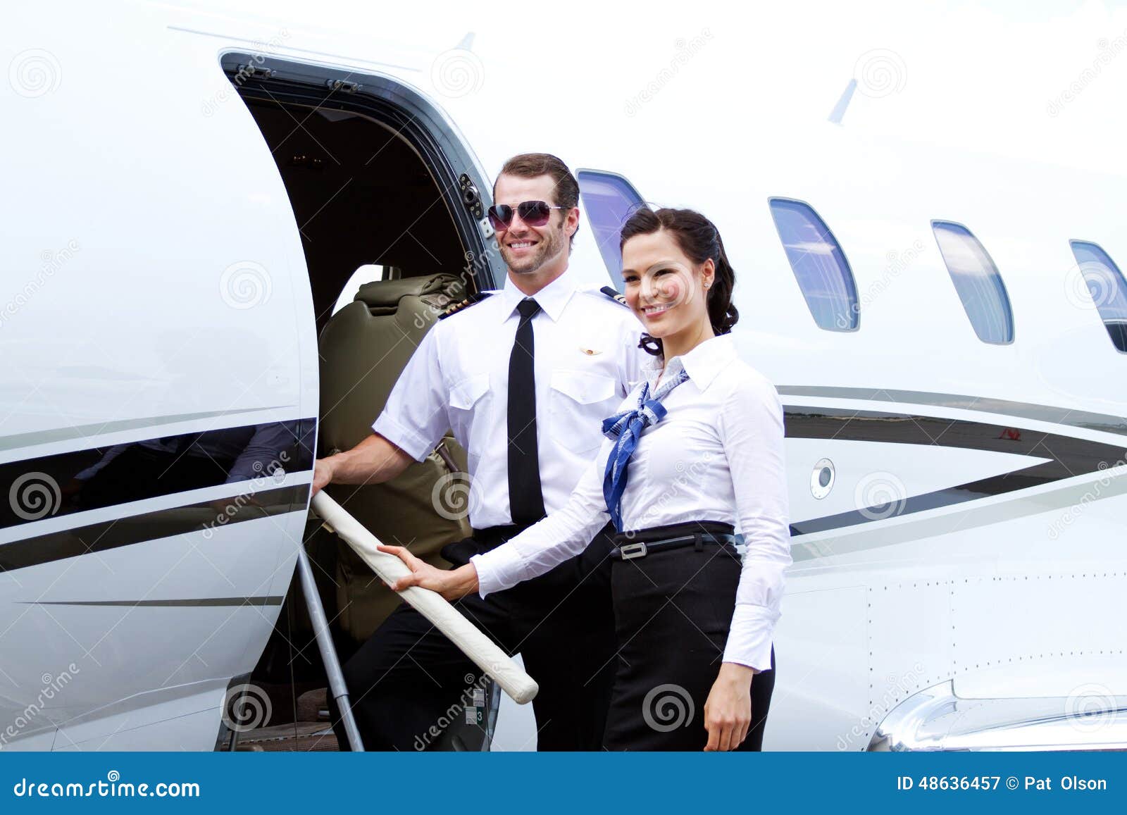 Pilot and Stewardess Stop before Entering Jet Stock Image - Image of ...
